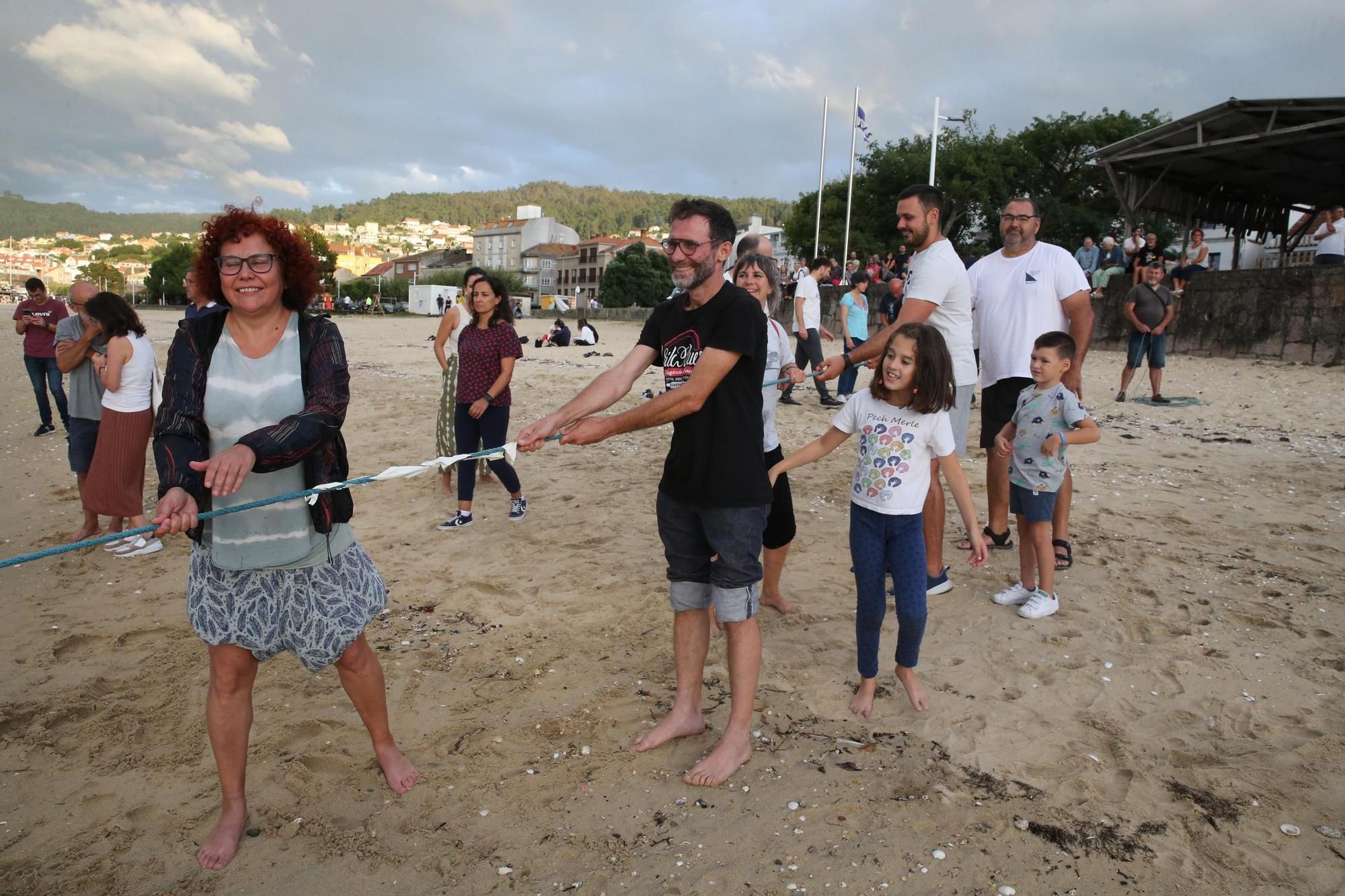 Una rapeta en la playa de Banda do Río. II Xornadas Bueu Vive o Mar