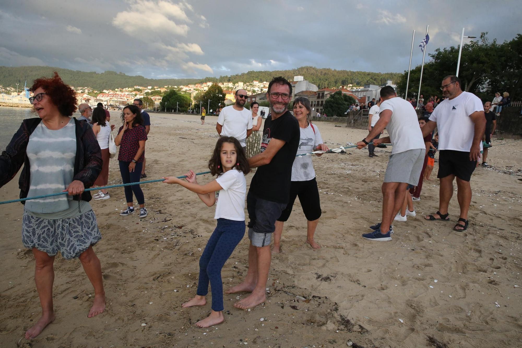 Una rapeta en la playa de Banda do Río. II Xornadas Bueu Vive o Mar