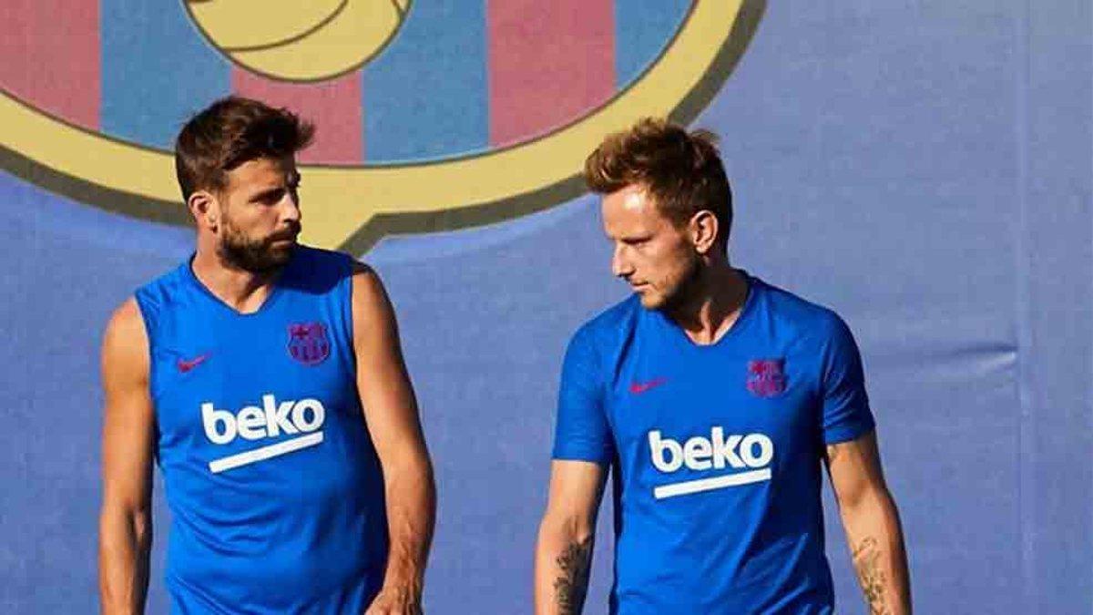 Piqué y Rakitic, bajas en el entrenamiento del Barça
