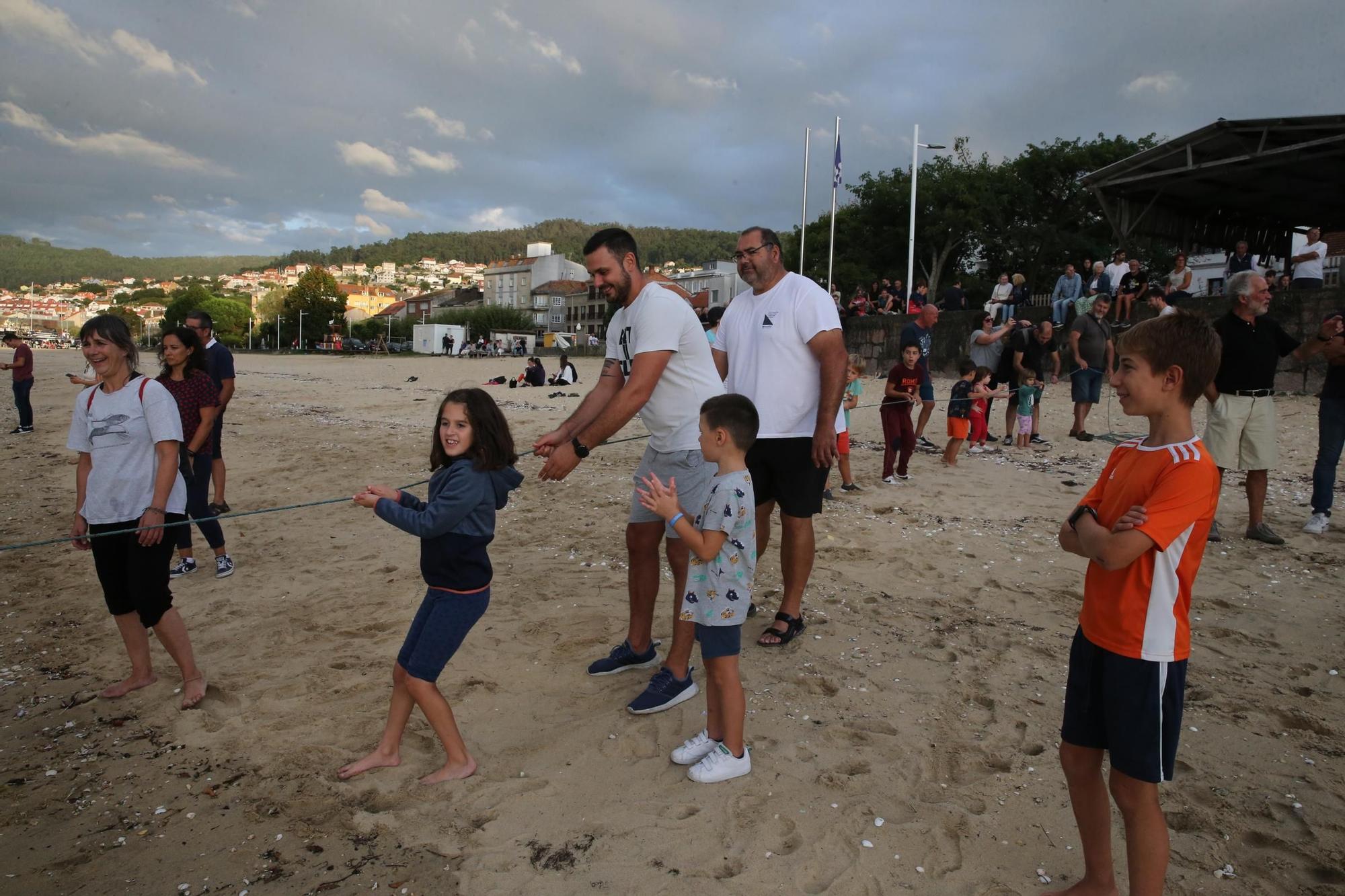 Una rapeta en la playa de Banda do Río. II Xornadas Bueu Vive o Mar