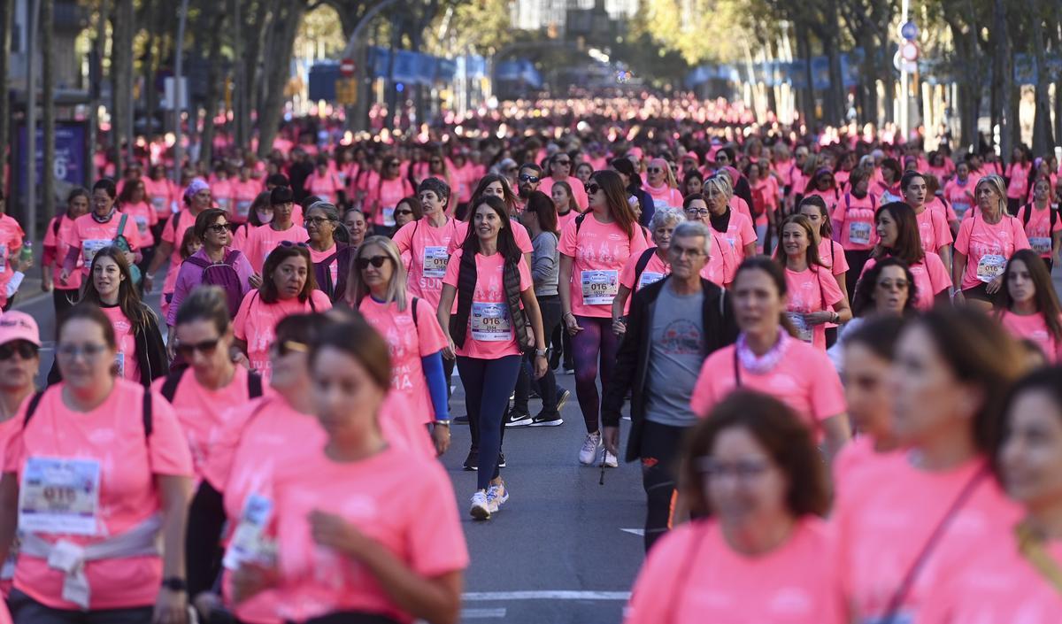 La Cursa de la dona, búscate en las fotos | FOTOS