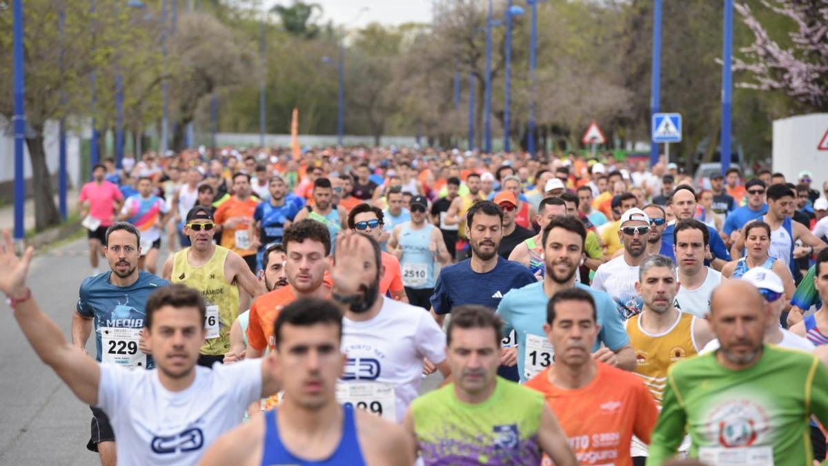 Domingo Gil y Laura Maasik se imponen en la Carrera Triana-Los Remedios ...